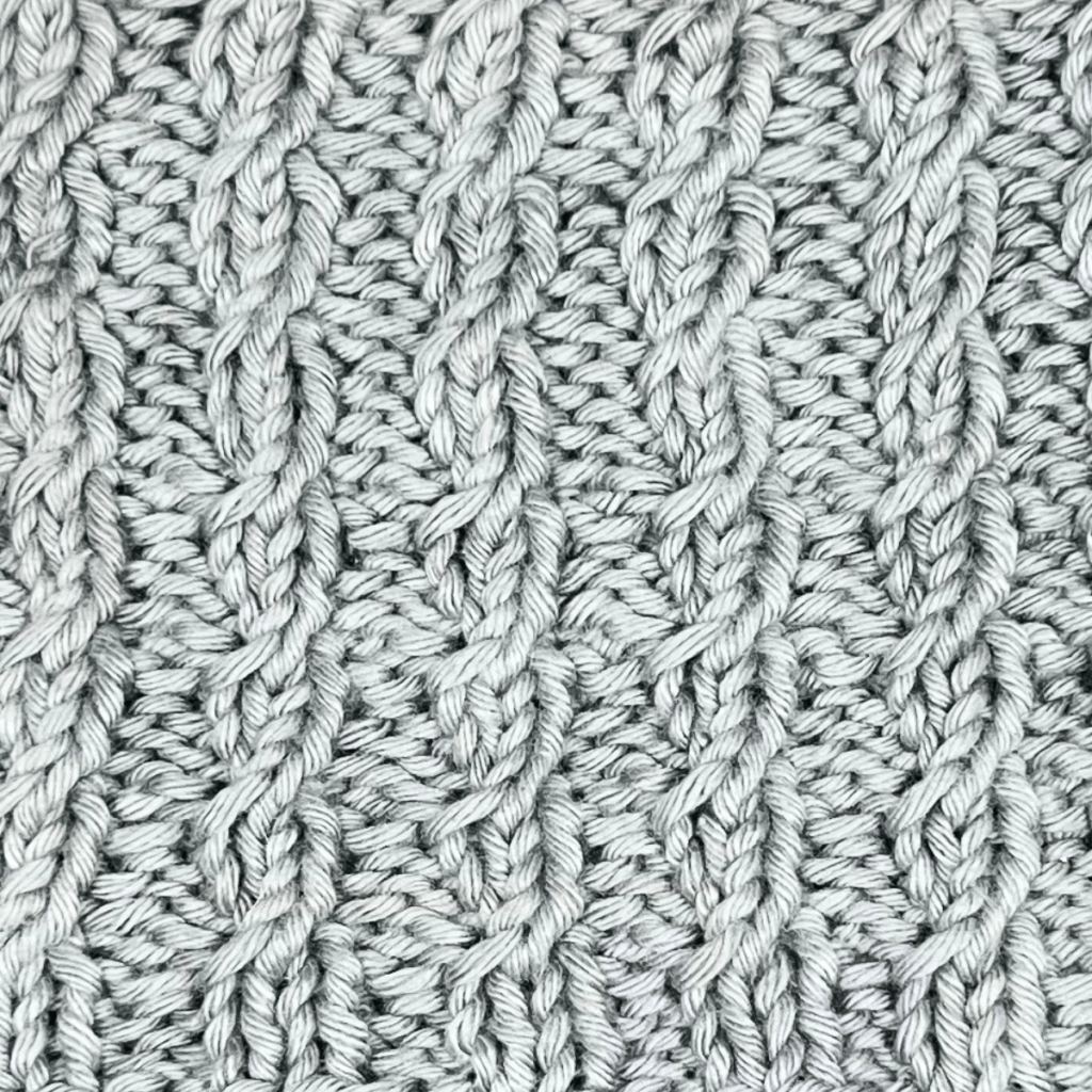 Gekreuztes 2x2 Rippenmuster stricken | simpleknittingpatterns.com